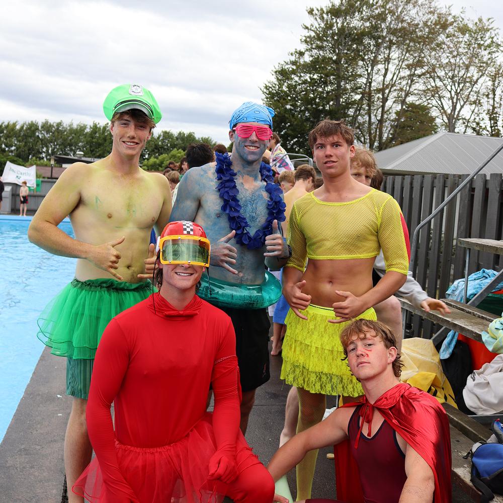 Rain fails to dampen spirits at swimming sports