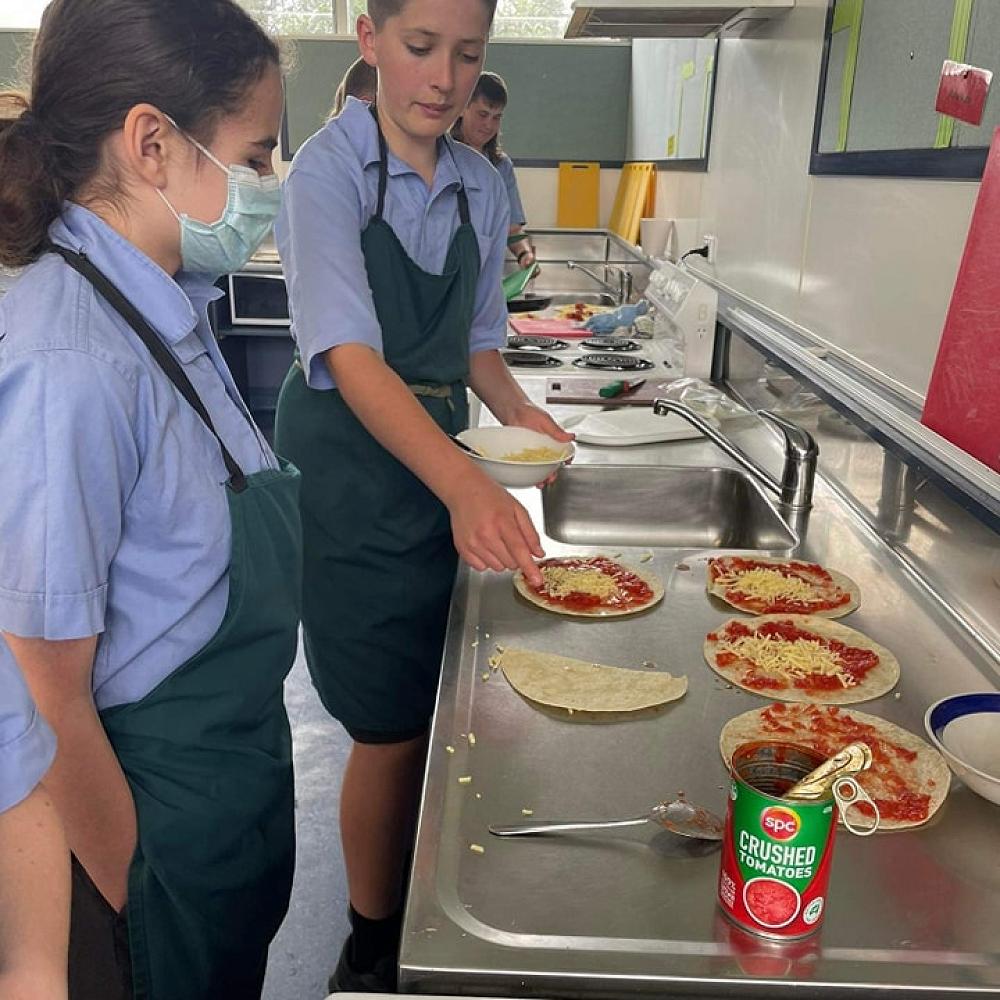 Check out our year 9 Food Tech students making some delicious quesadillas!