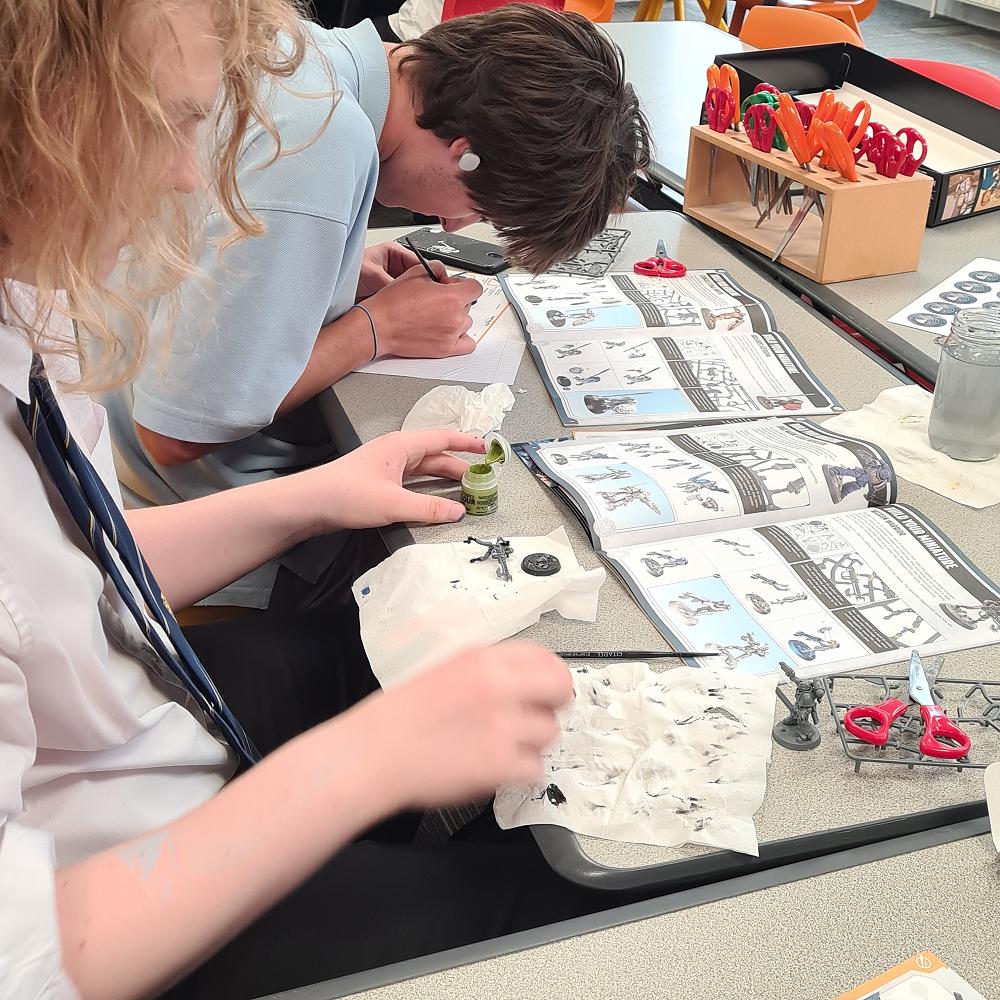 Students creating in Warhammer Club