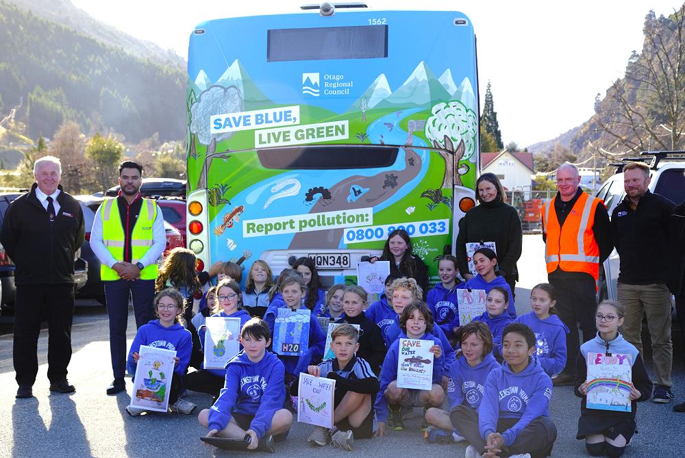 Back of Bus Designed with Artwork from QPS Students!