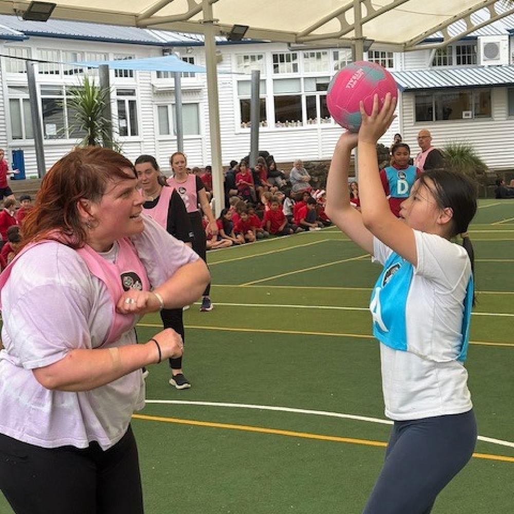 The perfect rainy backdrop for an intense game of netball — Term 4 2024 ...