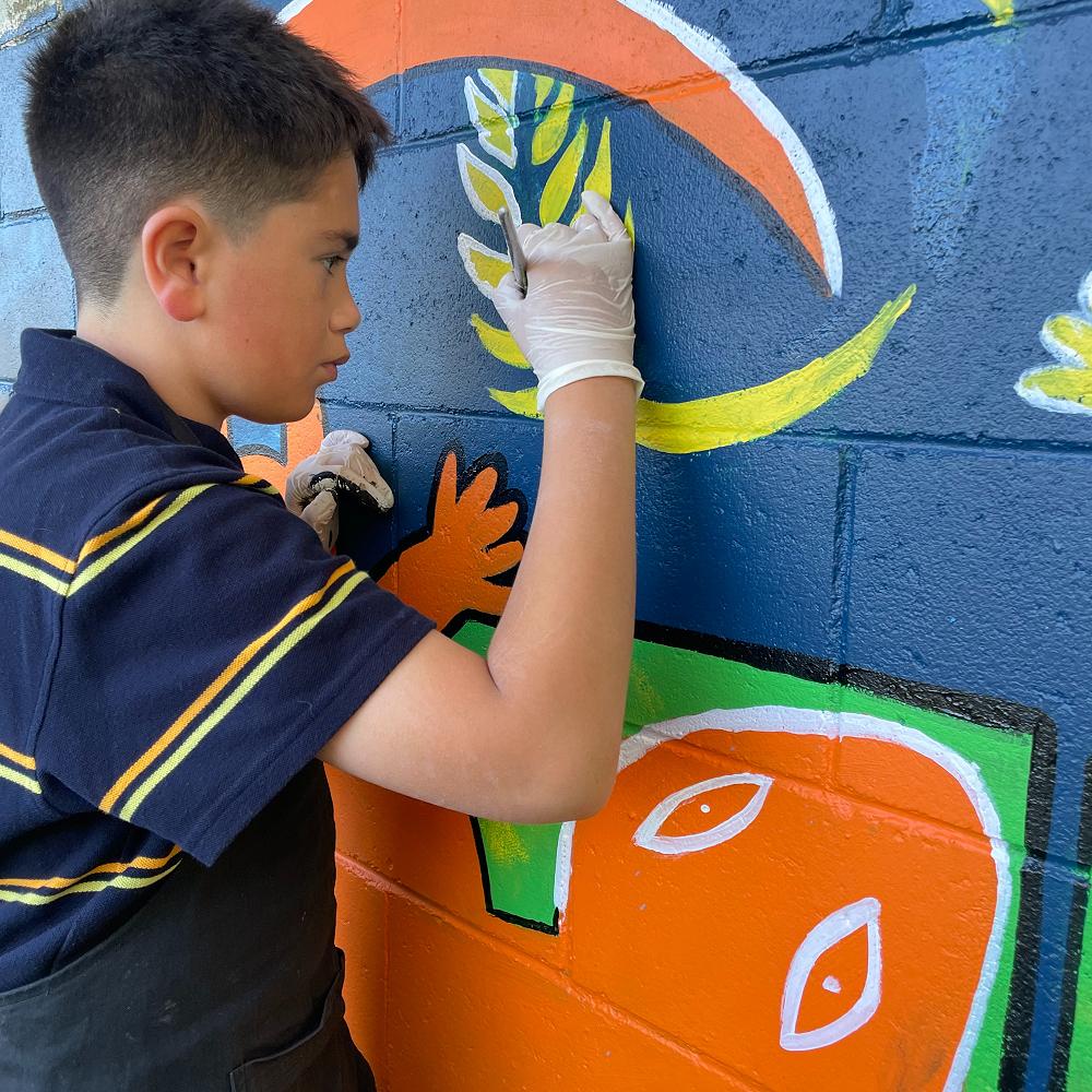 Talented Mural designers Maya Fletcher & Tāne Ryan. — April Newsletter