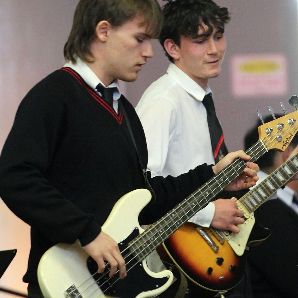 Musicians raise the roof at assembly