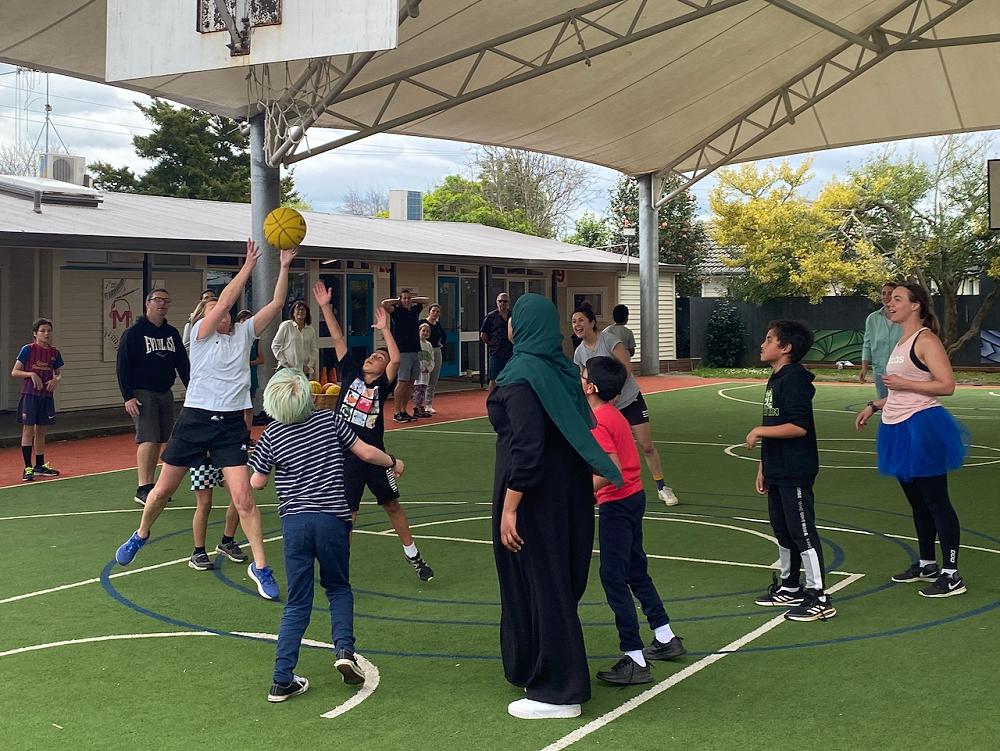 Lunchtime Basketball Game Students vs Staff